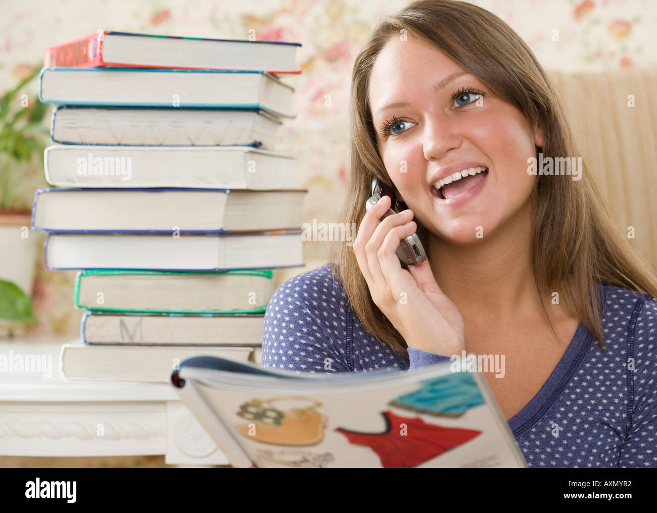 Books next to phone hi-res stock photography and images - Alamy