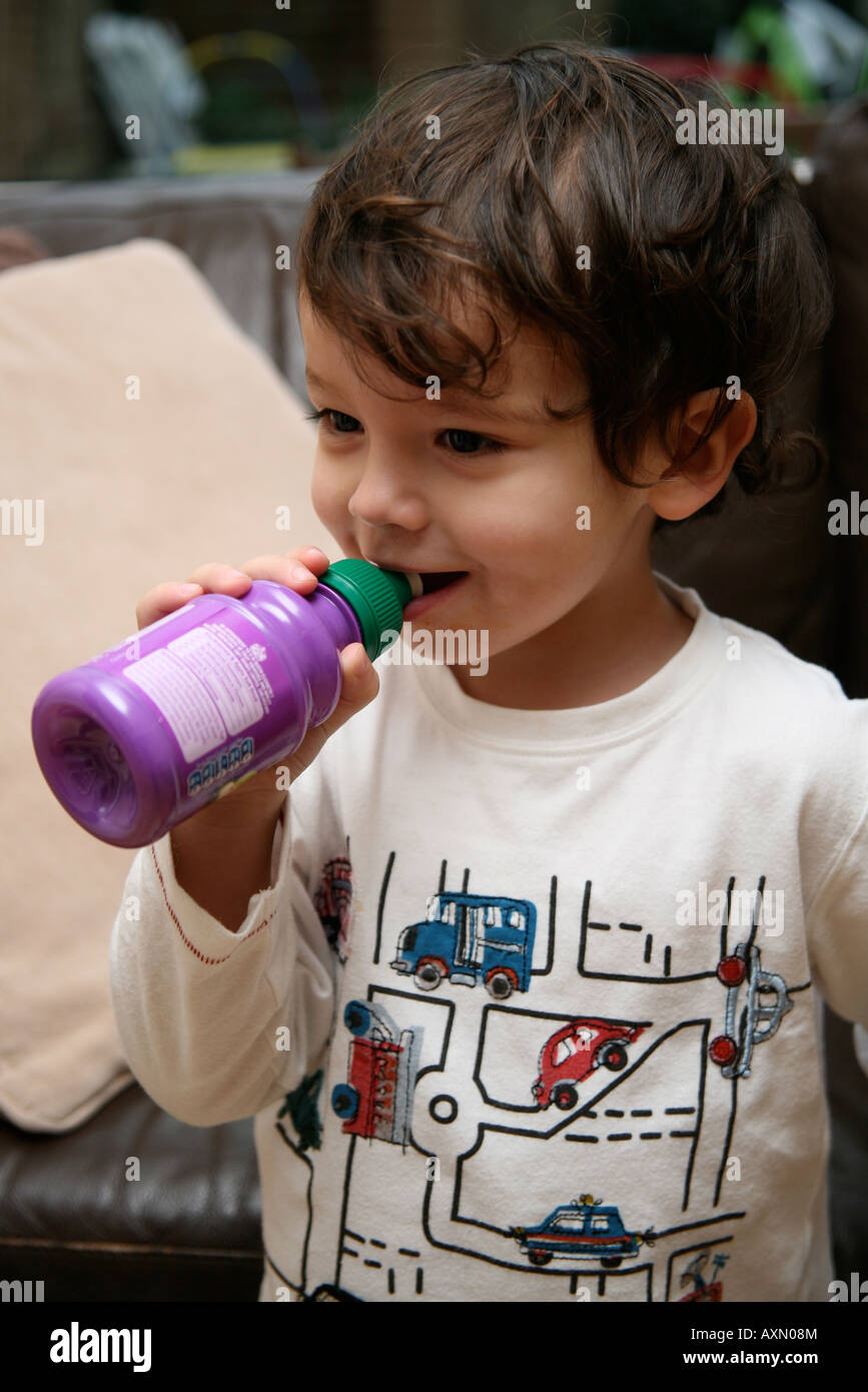 Child drinking fruit juice at school hi-res stock photography and ...