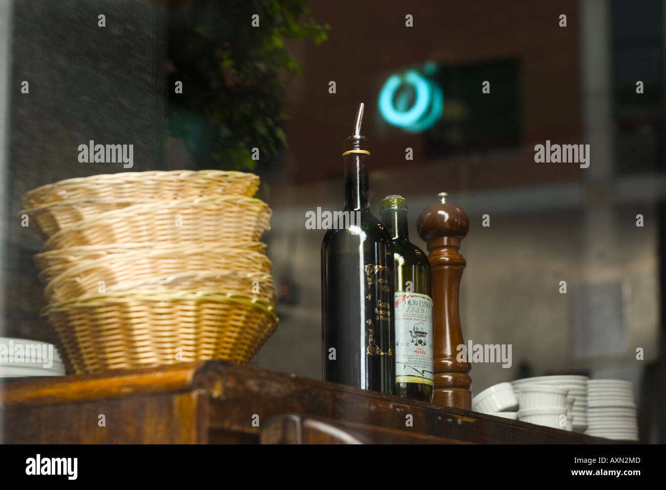 condiments and bread baskets in the window of a cafe Stock Photo - Alamy