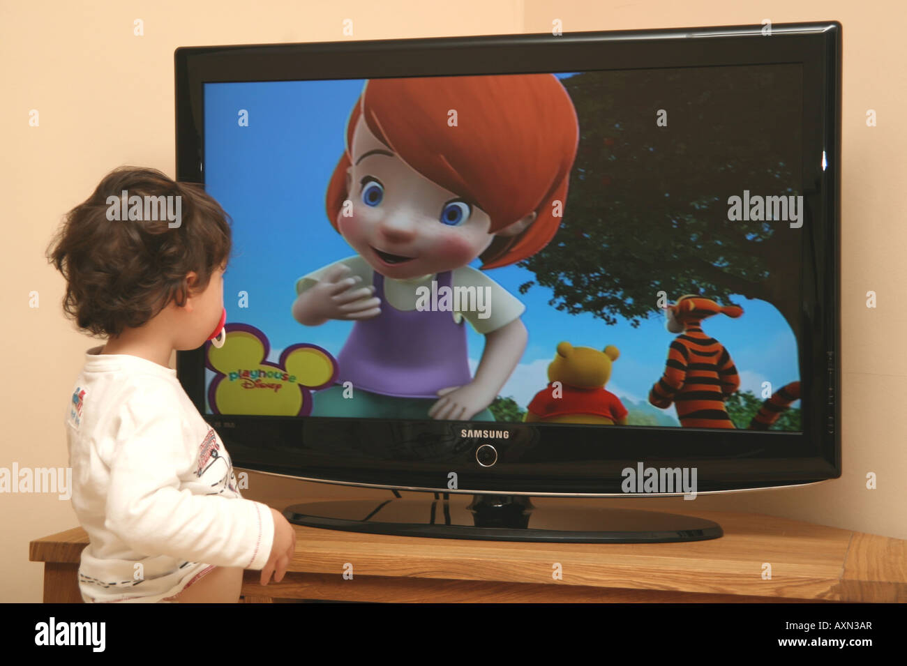 Boy Watch Tv Cartoon Stock Photos & Boy Watch Tv Cartoon Stock Images ...