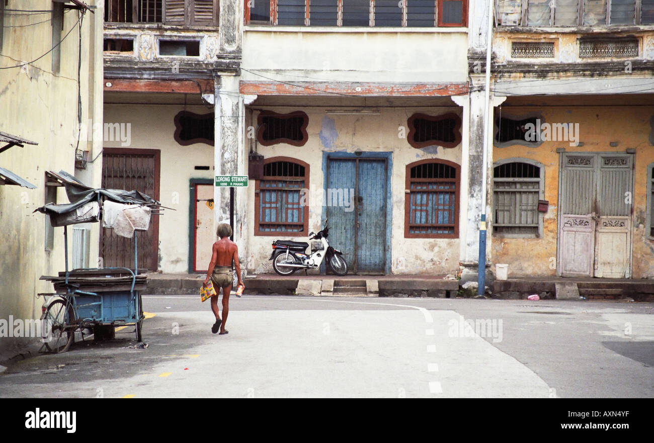 Tramp Walking Down Street Stock Photo - Alamy