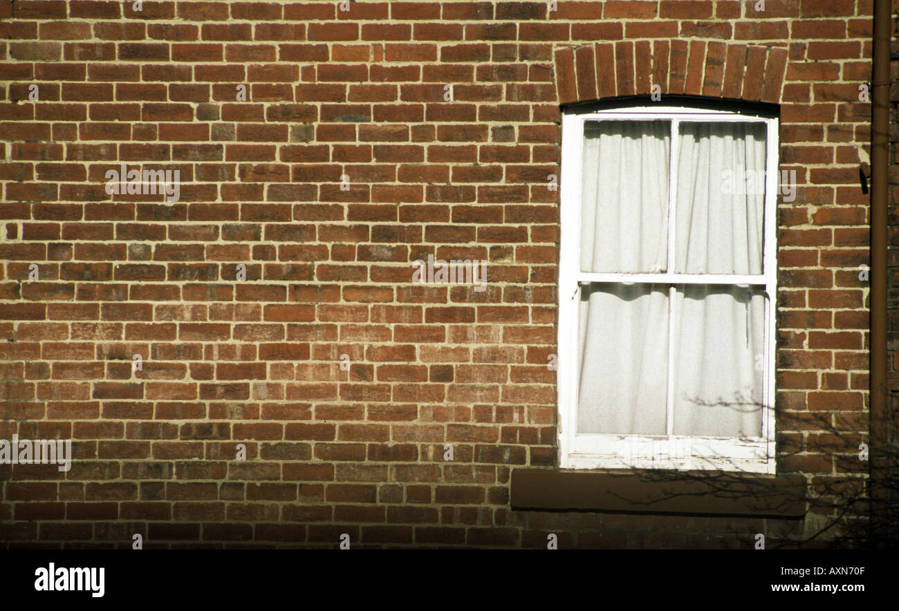 Brick wall and window Stock Photo - Alamy