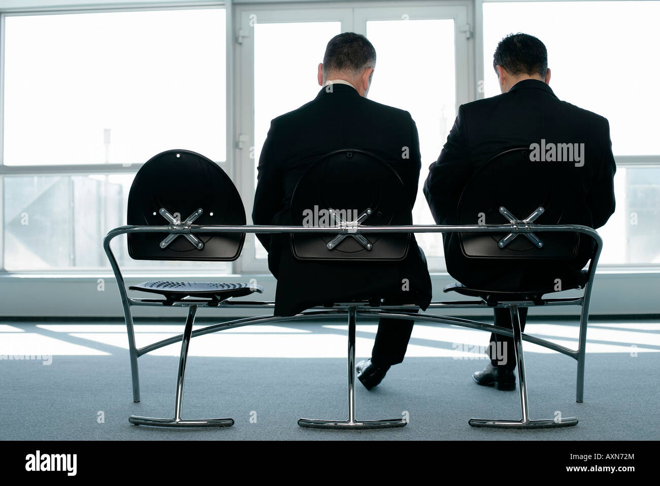 Two Men Man Sitting On A Bench Stock Photos & Two Men Man Sitting On A ...