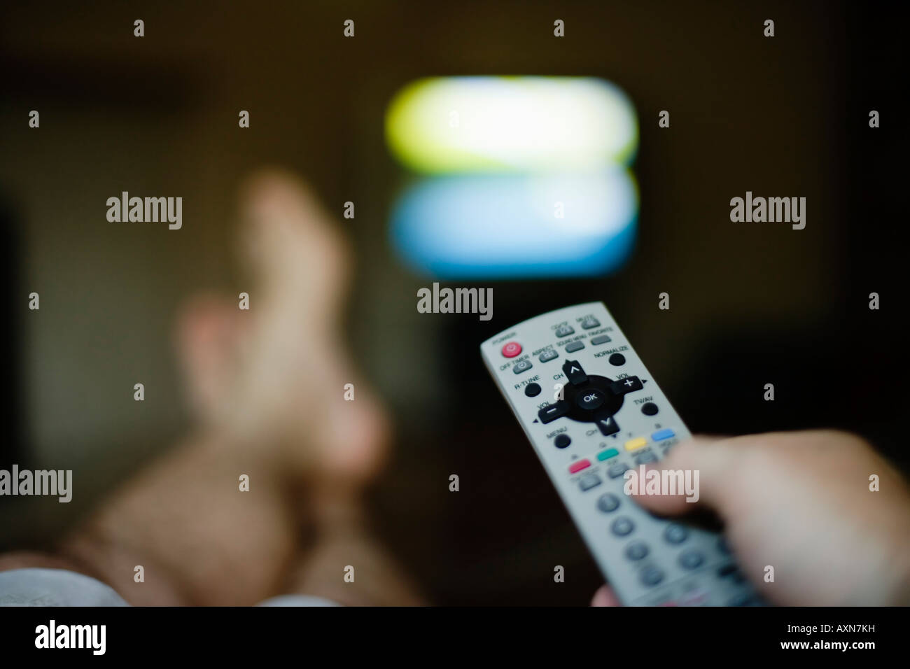 Man watching tv feet on hi-res stock photography and images - Alamy