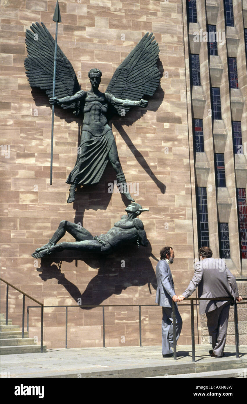 New Coventry Cathedral Statue of StMichael and the Devil with two men ...