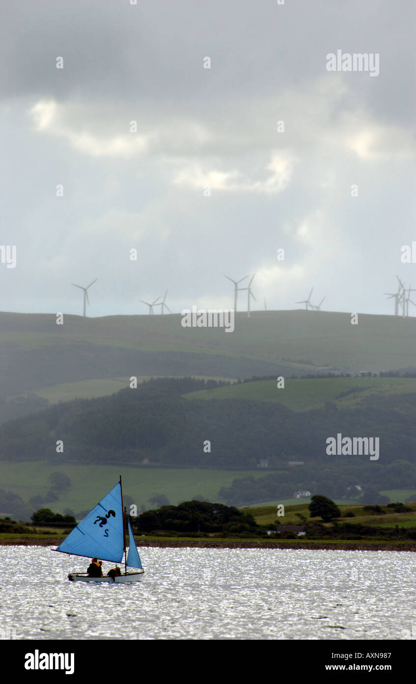 Sail boat and wind turbines Stock Photo - Alamy