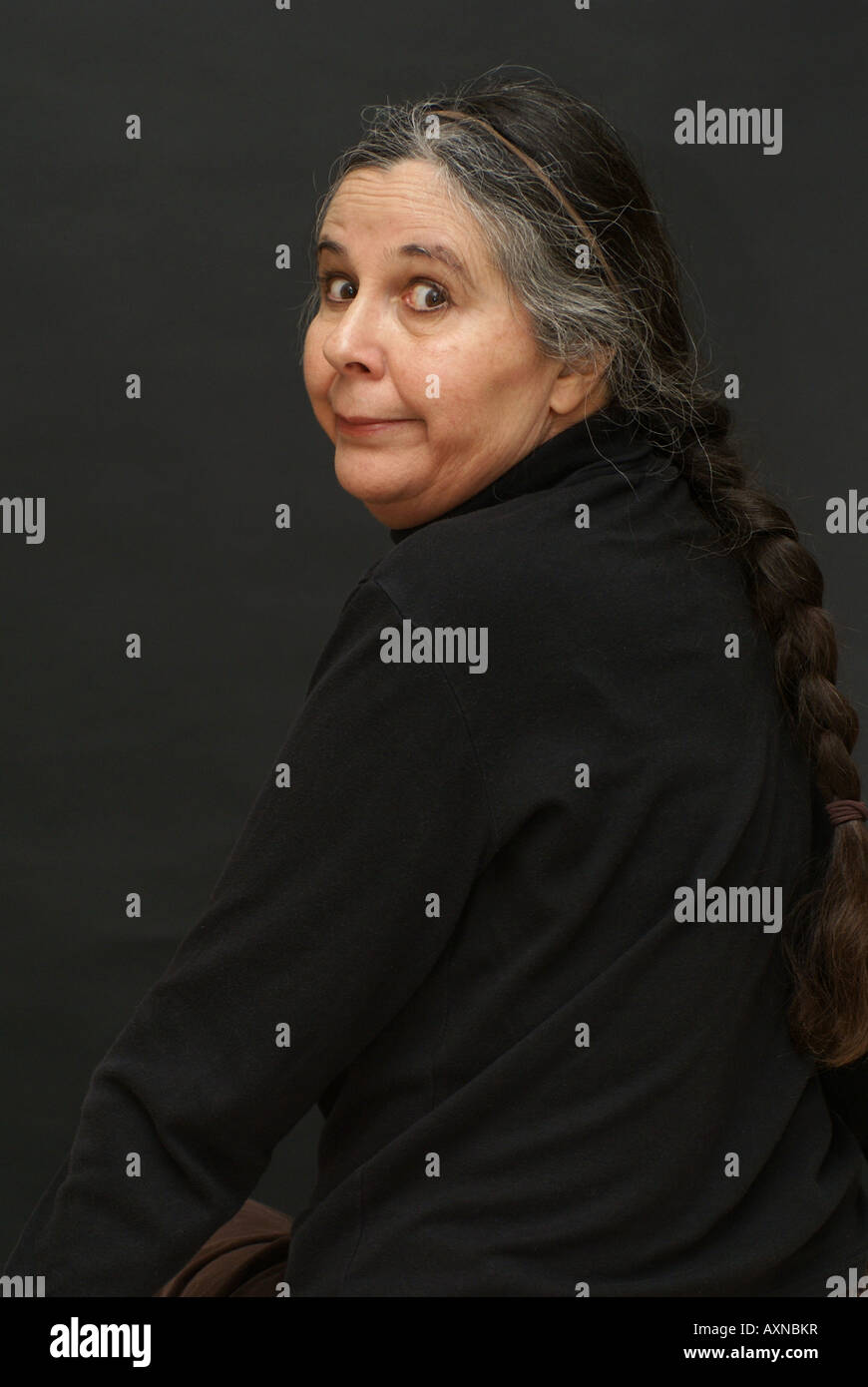 Looking back surprised shoulder hi-res stock photography and images - Alamy