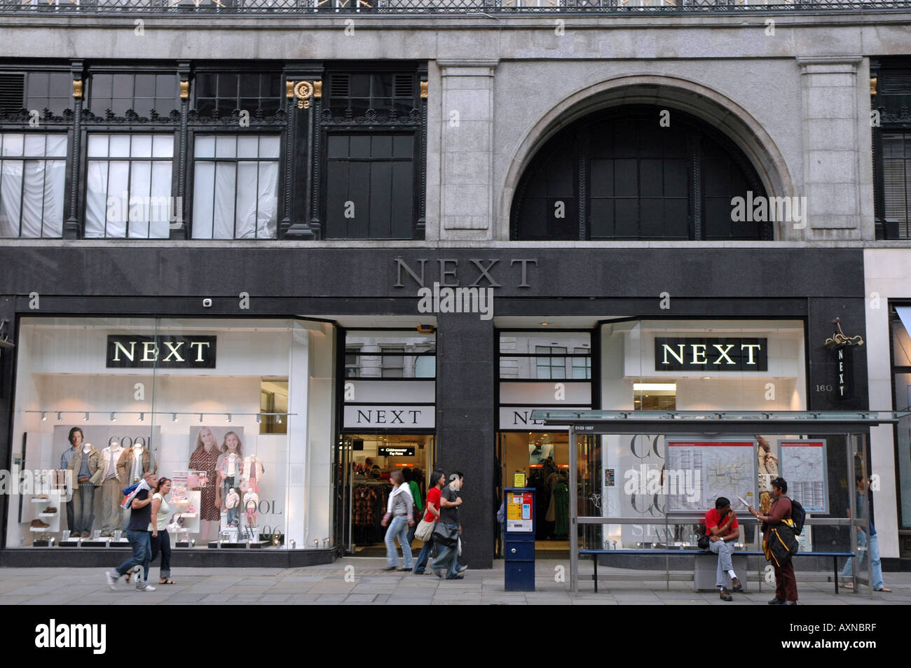 Bus stop next to building hi-res stock photography and images - Alamy