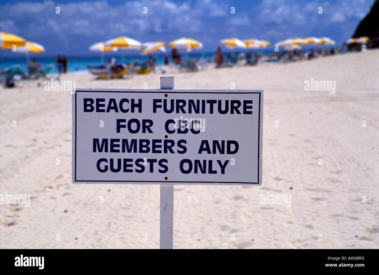 Private beach club sign with yellow and white umbrellas , Bermuda Stock ...