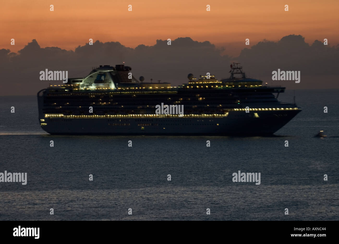 Closeup of Cruise ship entering Cabo san Lucas Bay in early morning ...