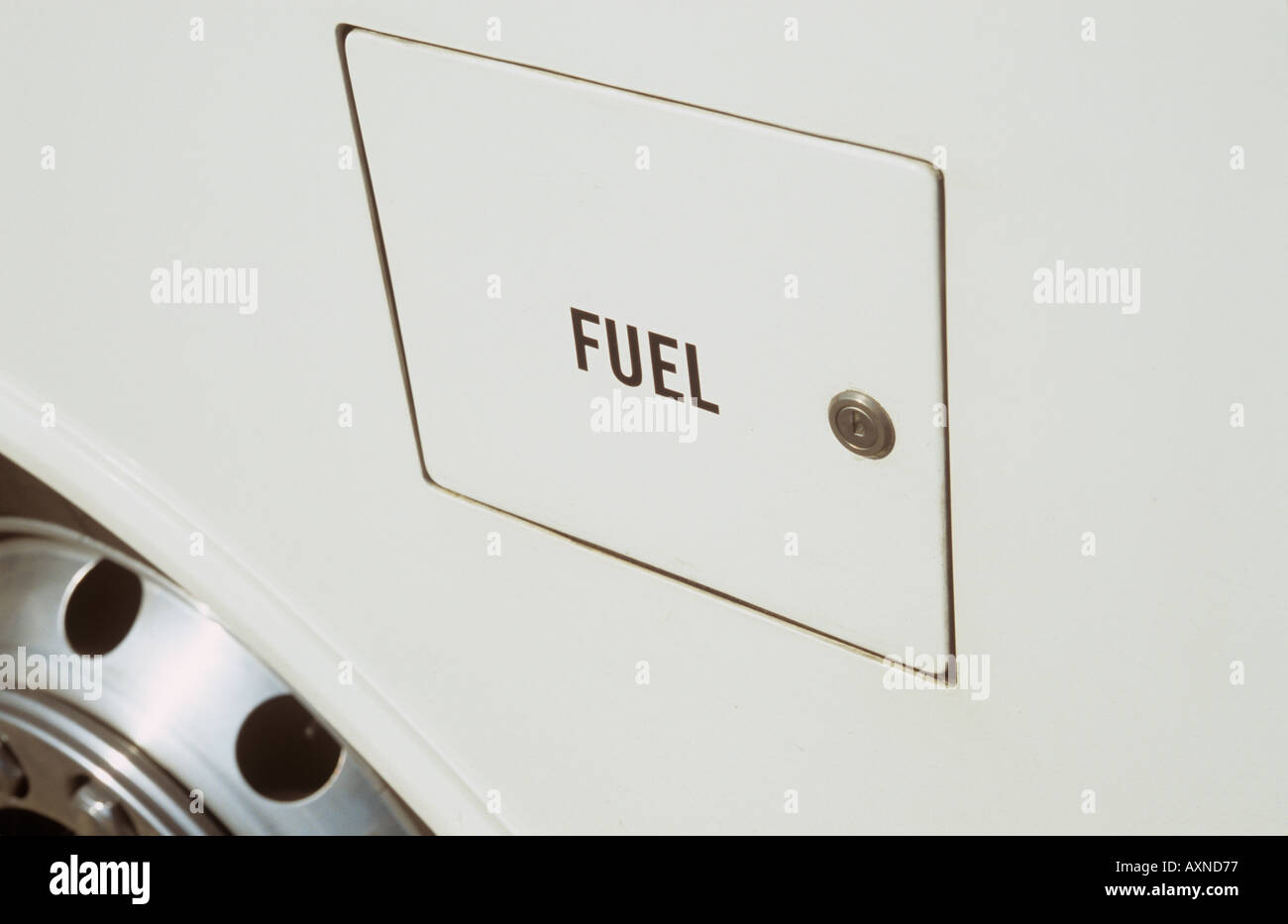 White lockable flap labelled Fuel on side of large vehicle Stock Photo ...
