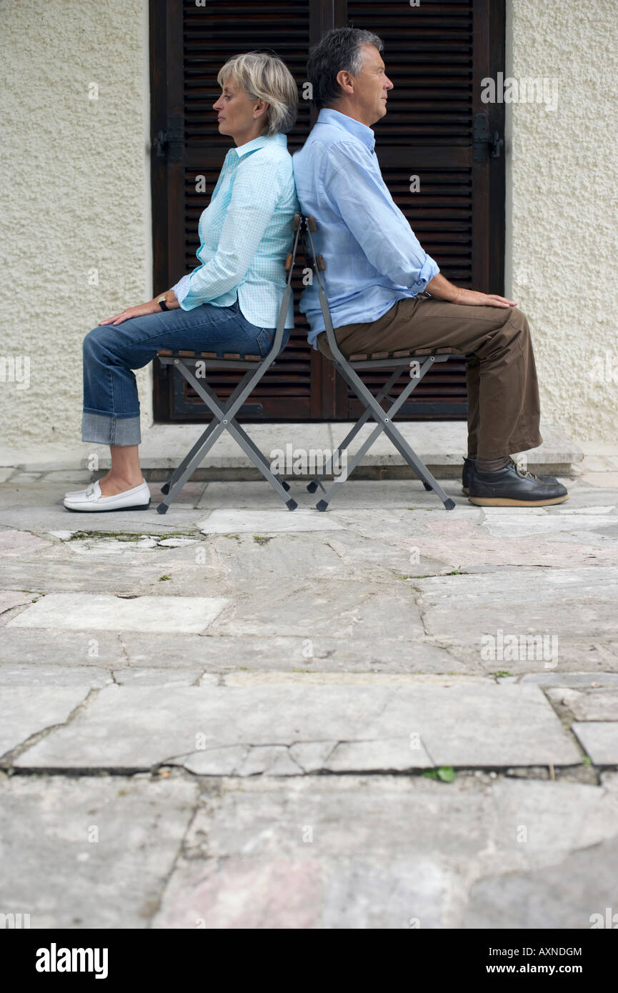 Couple sitting side side ignoring hi-res stock photography and images ...