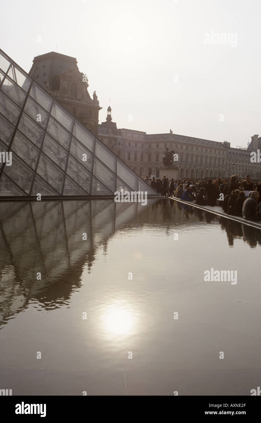 Louvre Pyramid Water Reflection Stock Photo - Alamy