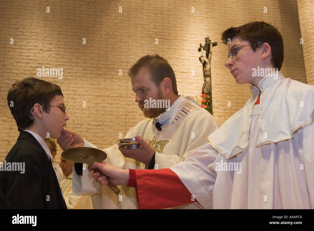 Catholic communion priest hi-res stock photography and images - Alamy