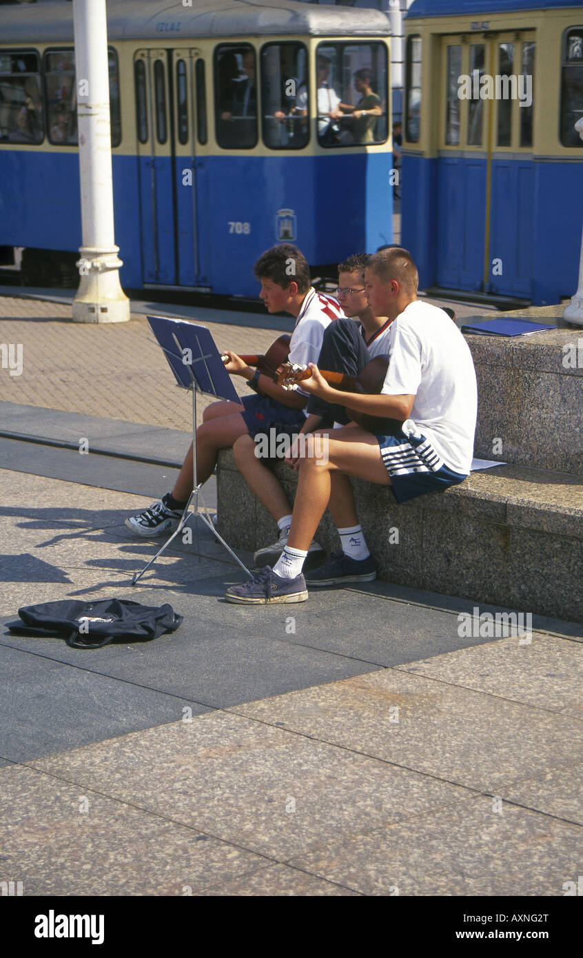 Bana Josip Jelacica square Two people playing musical instruments ...