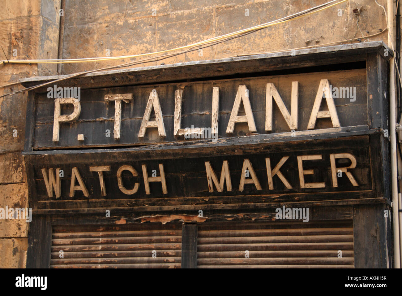 Faded shop sign, Valletta, Malta Stock Photo - Alamy