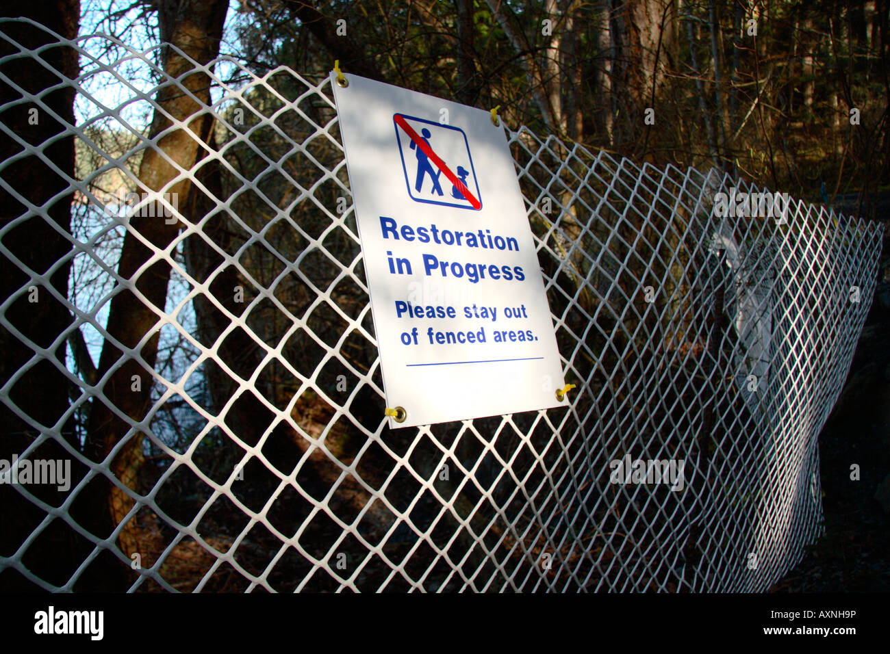 sign on fence Stock Photo - Alamy