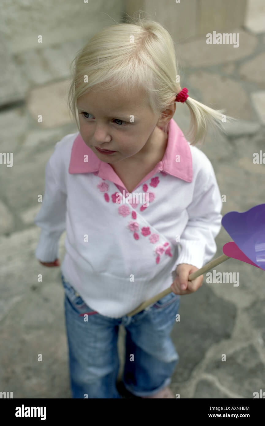 Little girl with a pin wheel in her hand, high angle view Stock Photo ...