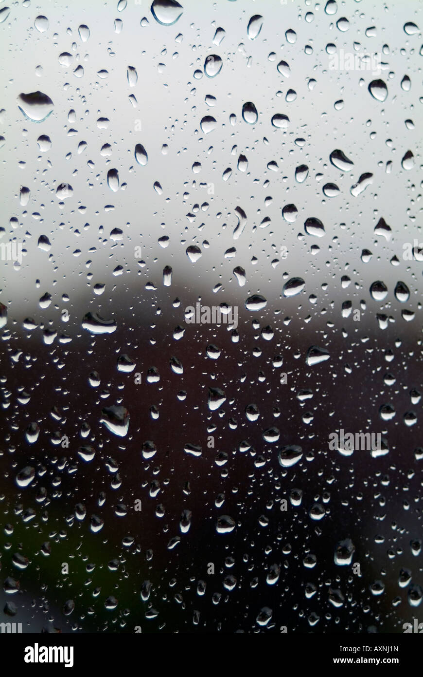 rain drops on window pane glass Stock Photo - Alamy