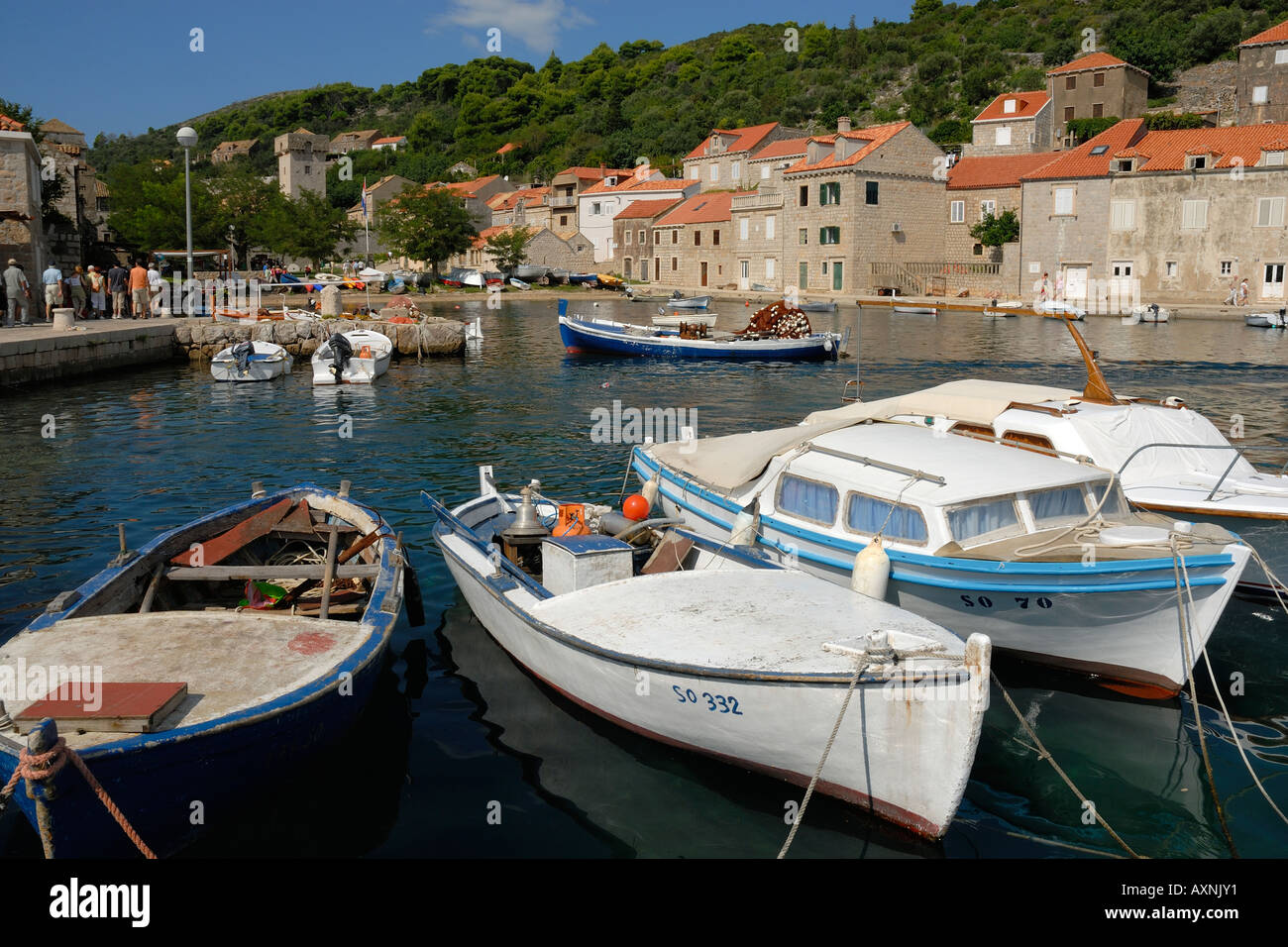 Small fishing boats in the port of Sudurad on the Elaphite island of ...