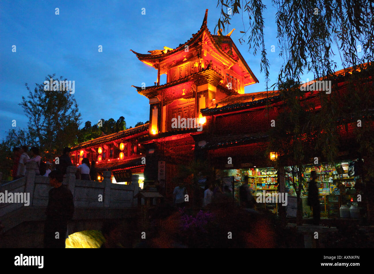 Lijiang at night. Colorful lights on the traditional buildings in ...