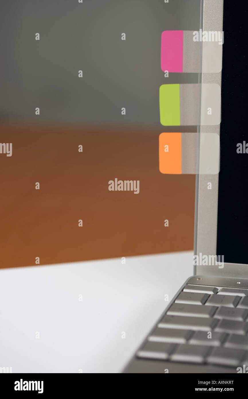 Post-it notes at a laptop Stock Photo - Alamy