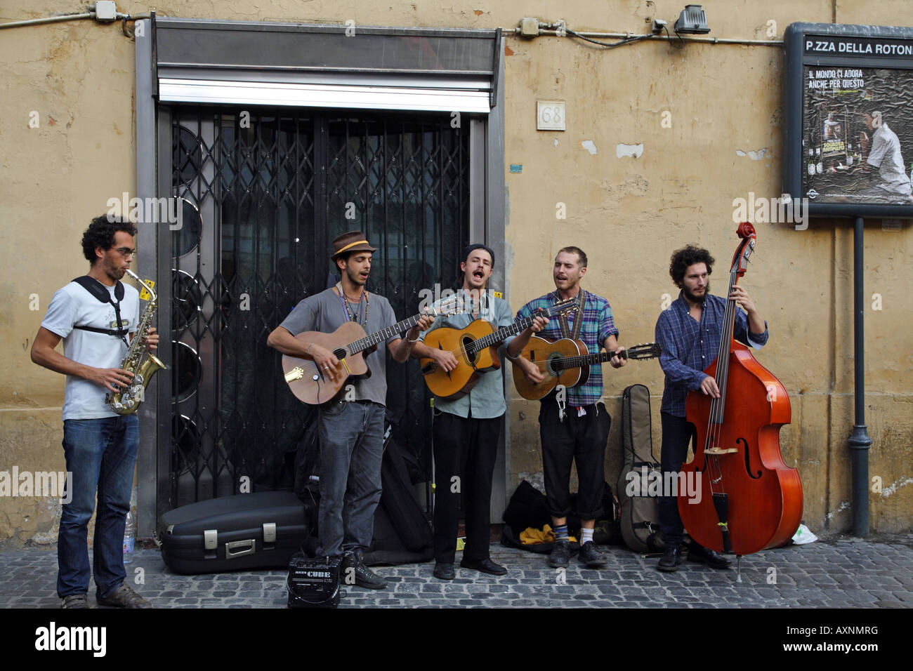 Group of street entertainers in the square outside the Pantheon in Rome ...