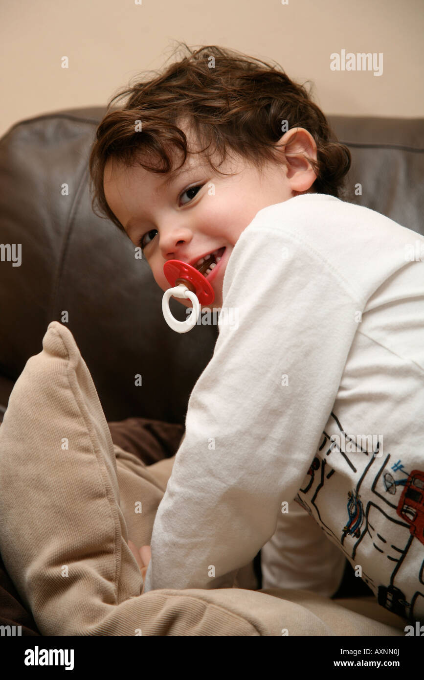 Toddler with dummy Stock Photo - Alamy
