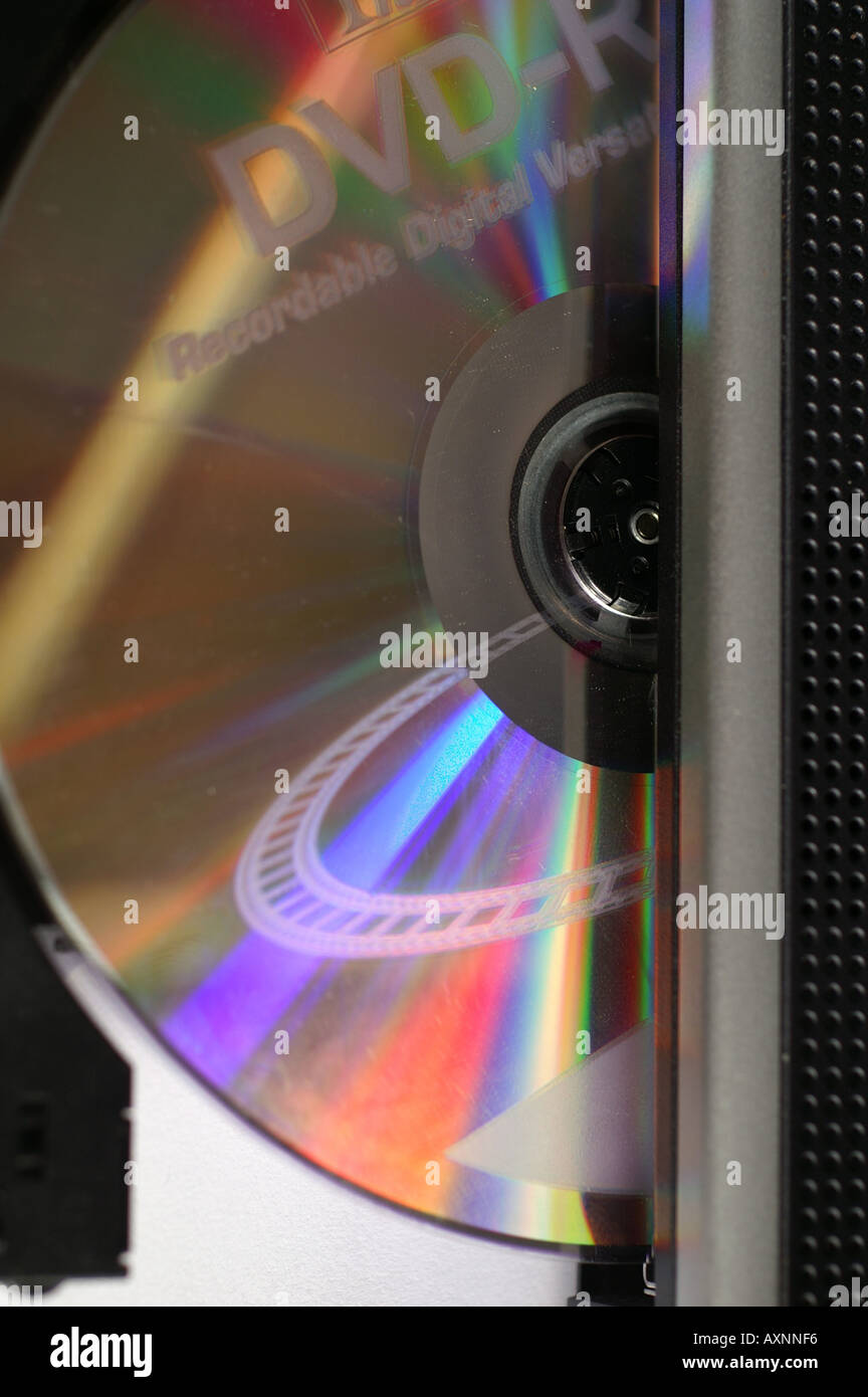 DVD on loading tray for optical reader Stock Photo - Alamy