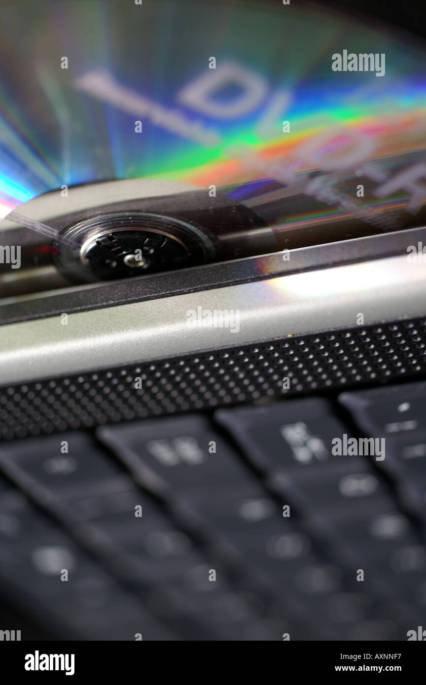 DVD on loading tray for optical reader Stock Photo - Alamy