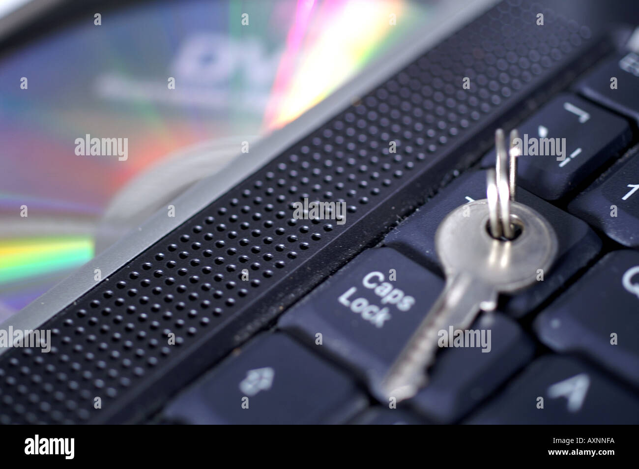 Key by Caps lock button on laptop keyboard security digital risk ...