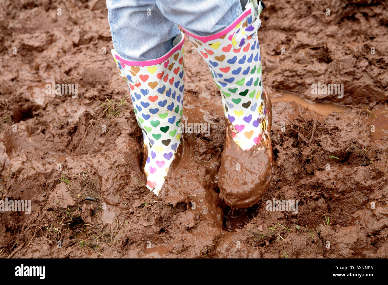 In wellies standing in muddy hi-res stock photography and images - Alamy