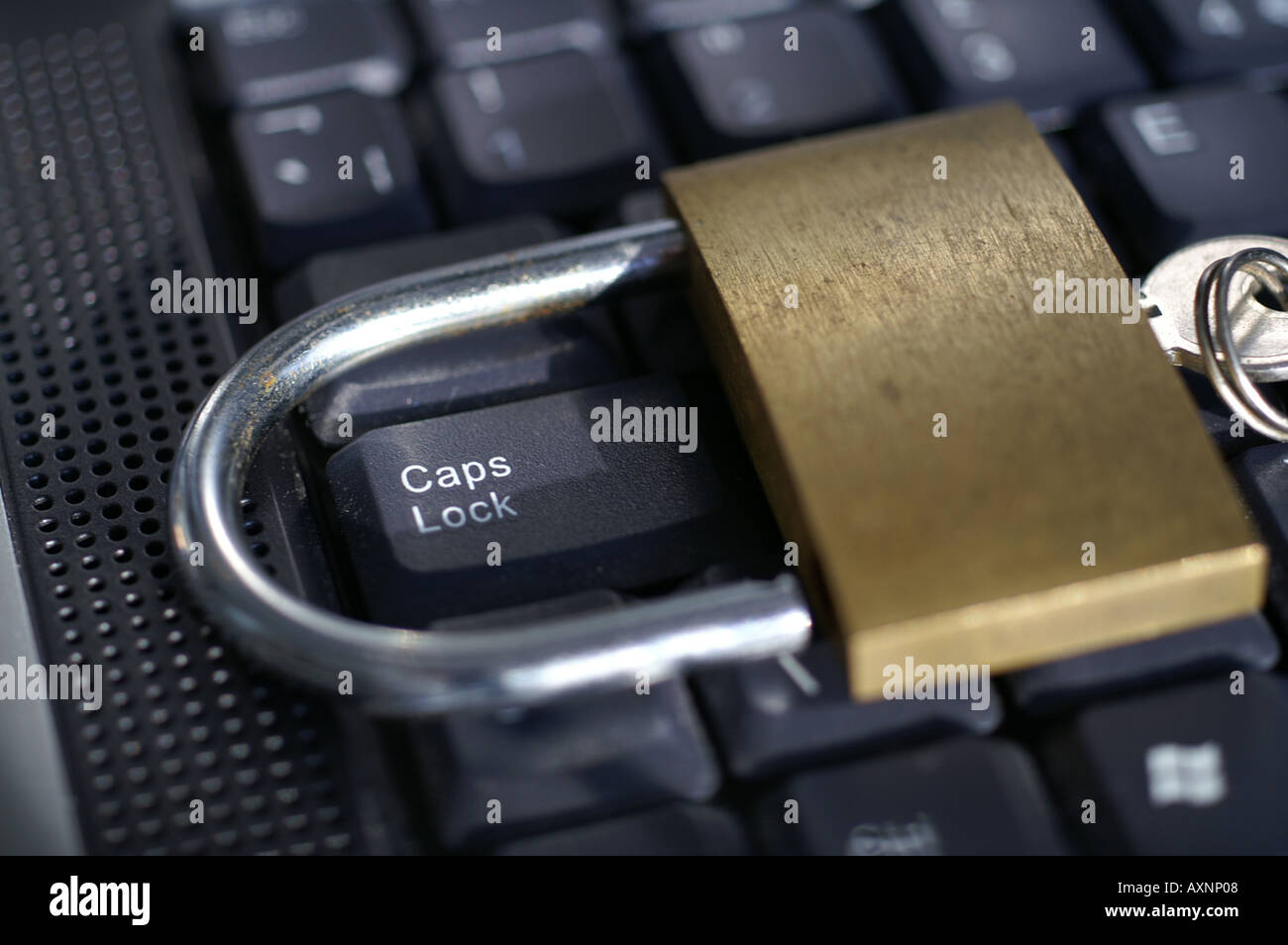 Open padlock around Caps lock key on laptop keyboard Stock Photo - Alamy