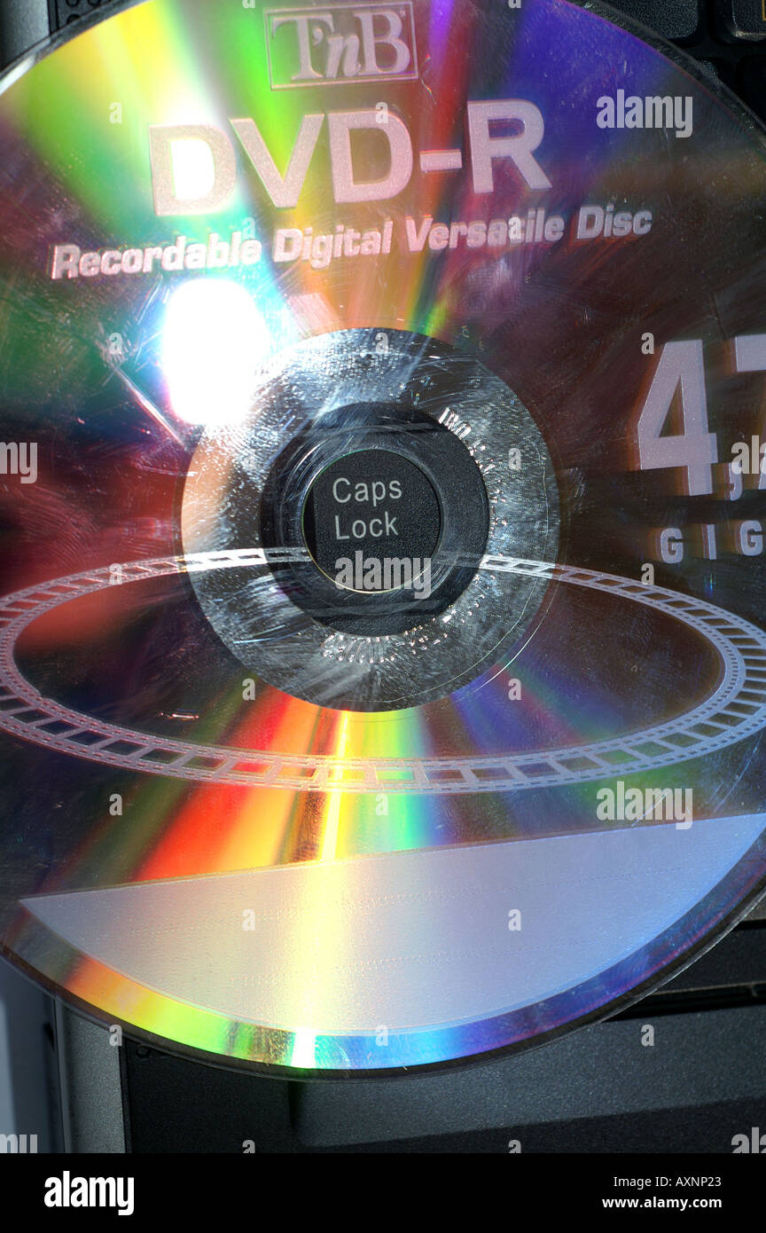 DVD hole around caps lock light diffraction spectrum colours disc audio ...