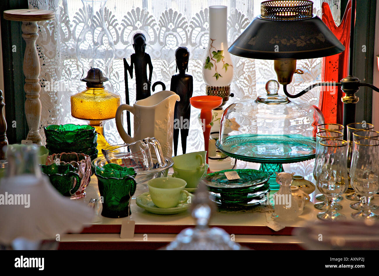 Thrift shop display of antiques Stock Photo - Alamy