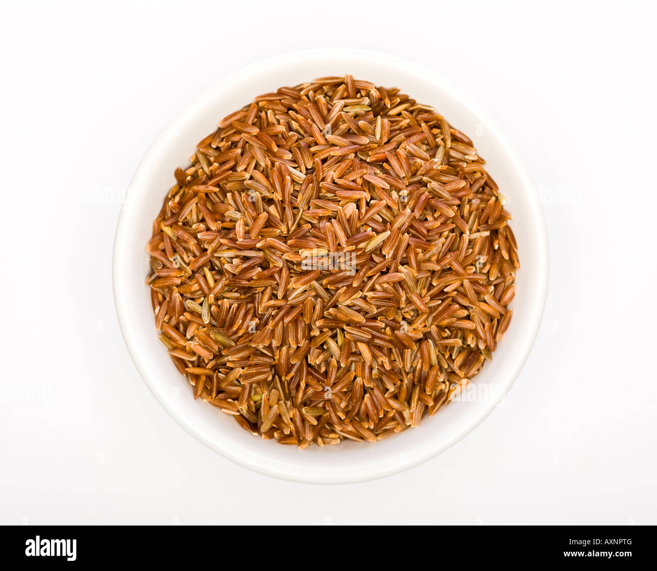 Brown rice in a white bowl Stock Photo - Alamy