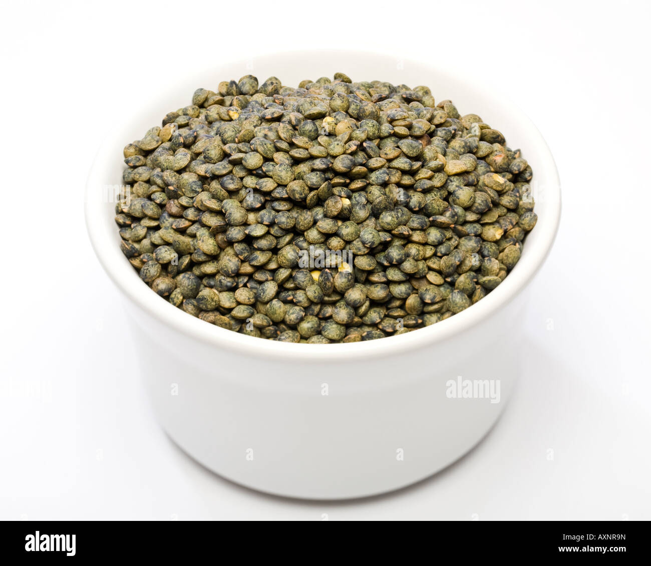 Puy Lentils in a white bowl Stock Photo - Alamy