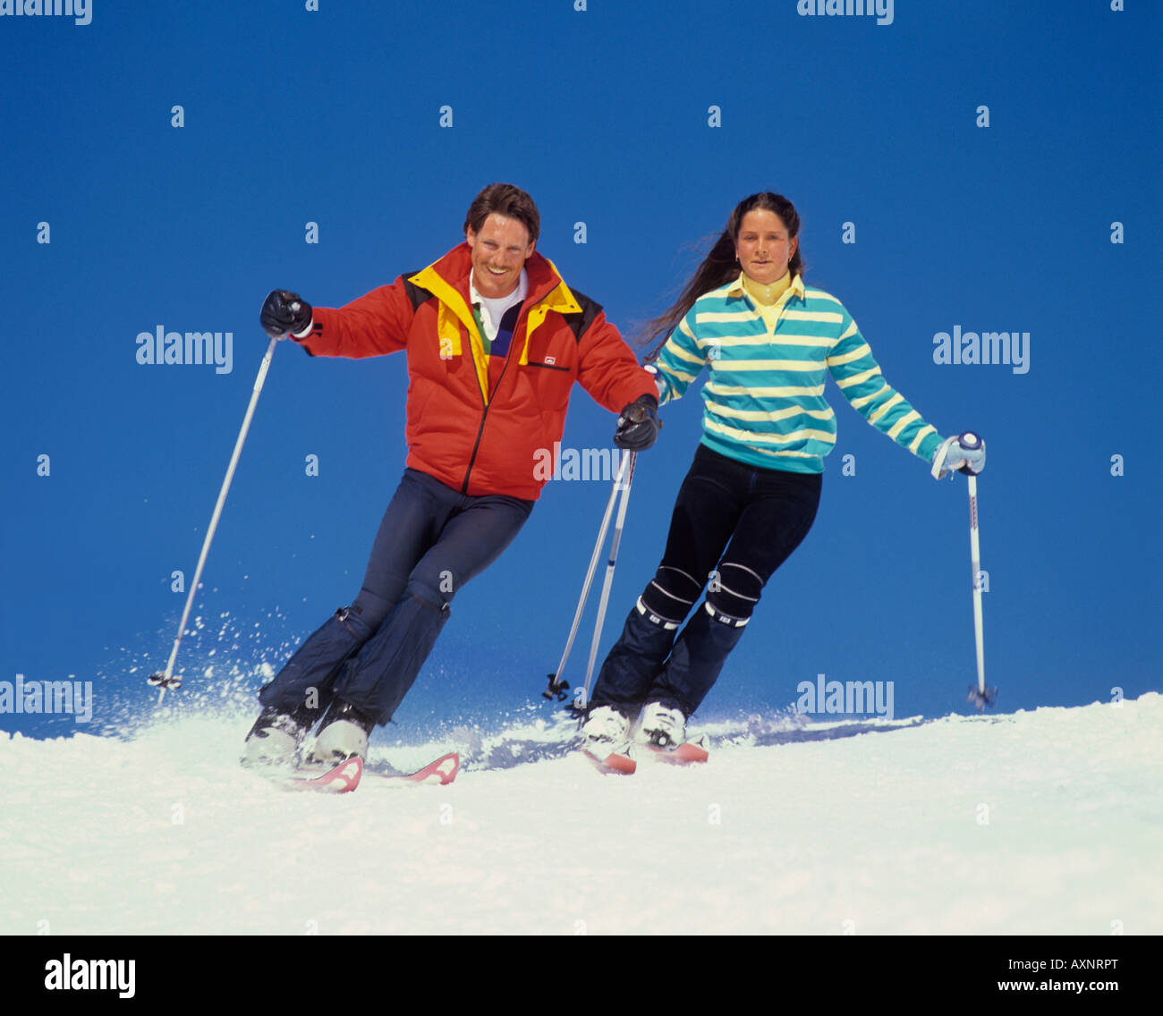 0321 Couple skiing Stock Photo - Alamy
