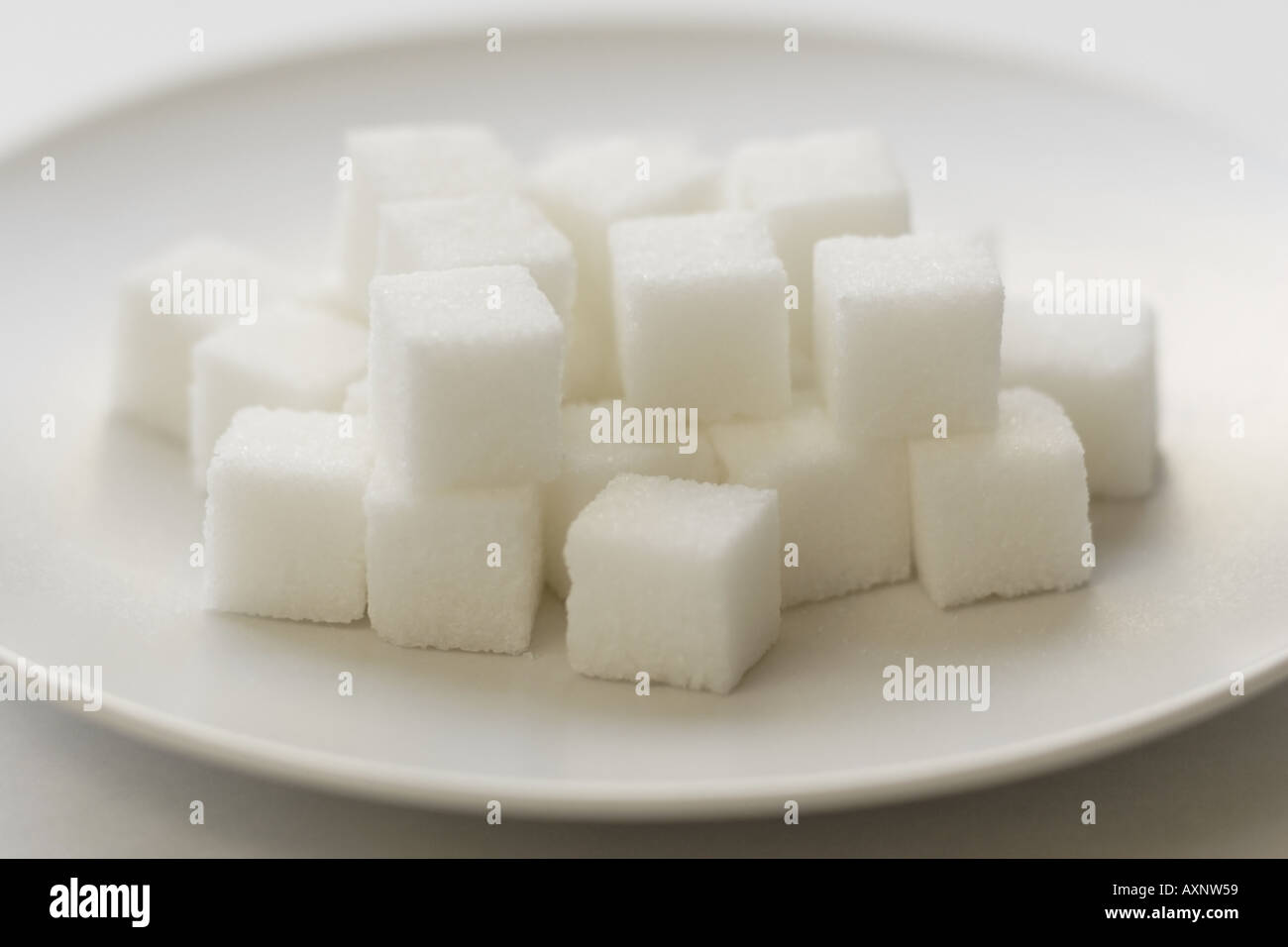 white sugar cubes Stock Photo - Alamy