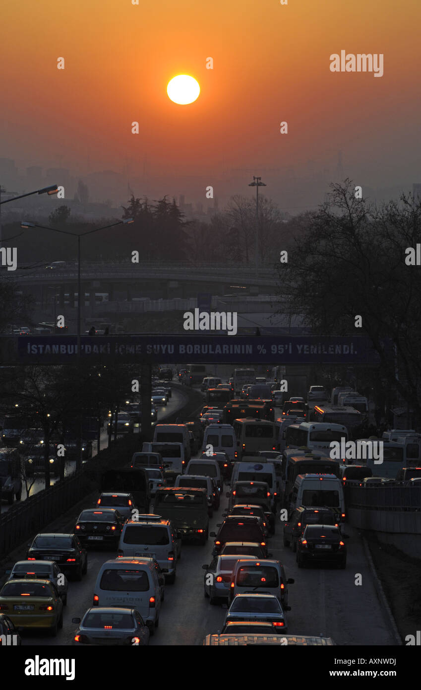 Heavy traffic jam with a beautiful sunset in background Stock Photo - Alamy