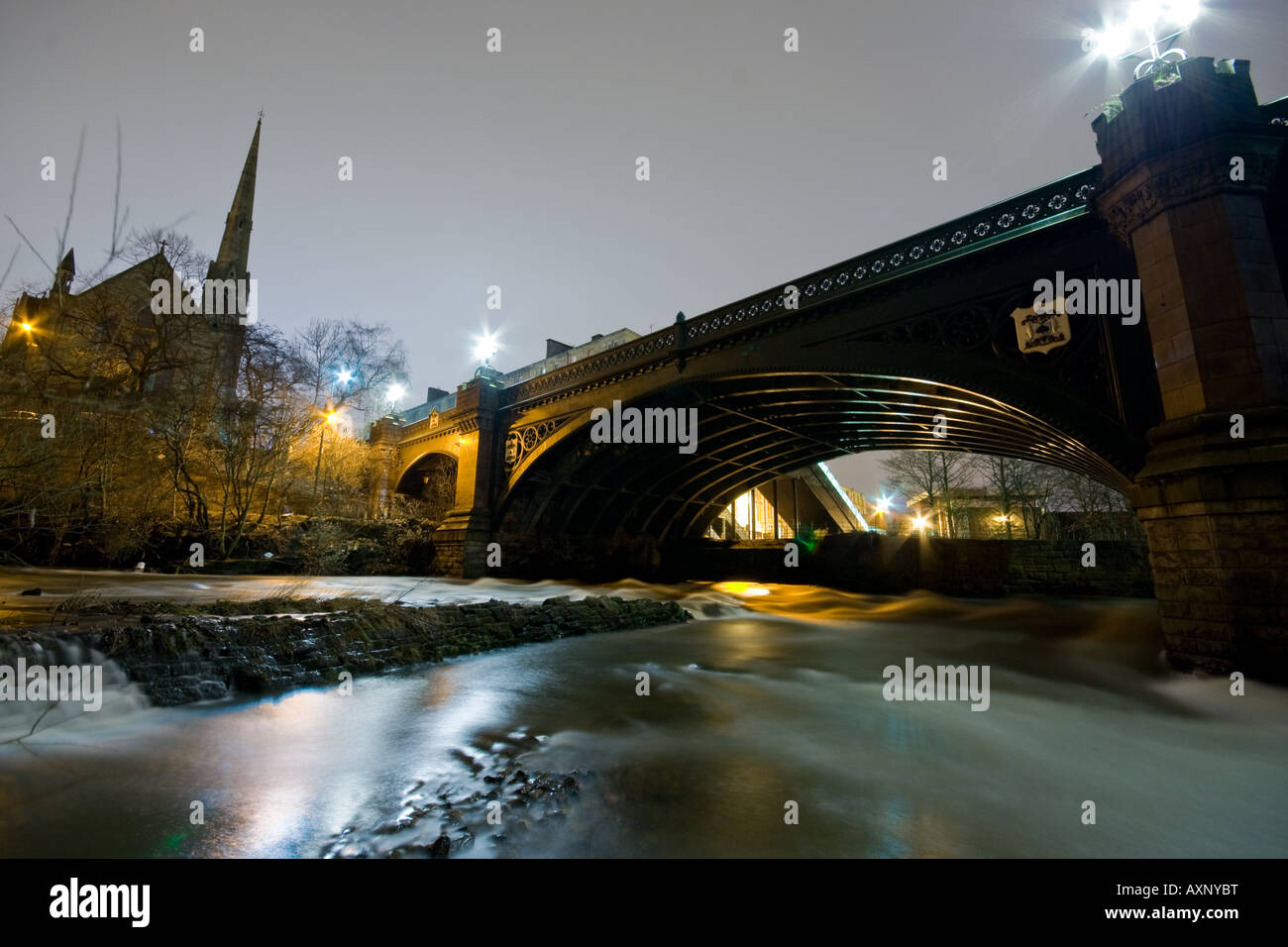 A bridge over a river at night, with reflections Stock Photo - Alamy