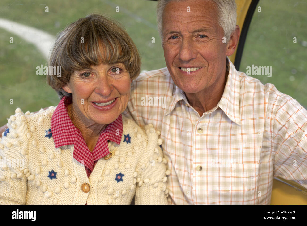 Senior adult couple in a cable car, close-up Stock Photo - Alamy