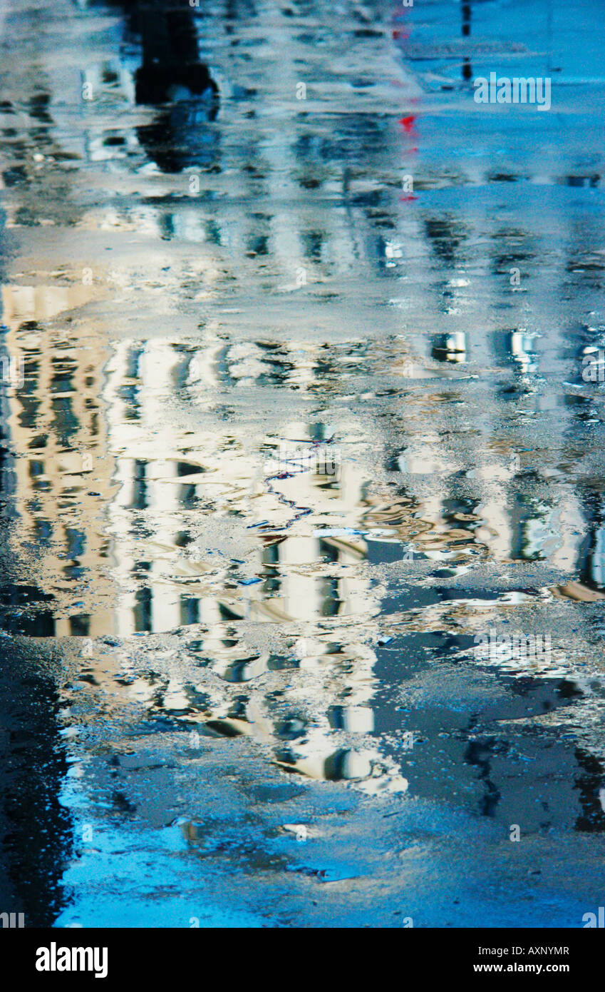 Reflection on pavement after rain in Marais region of Paris France ...