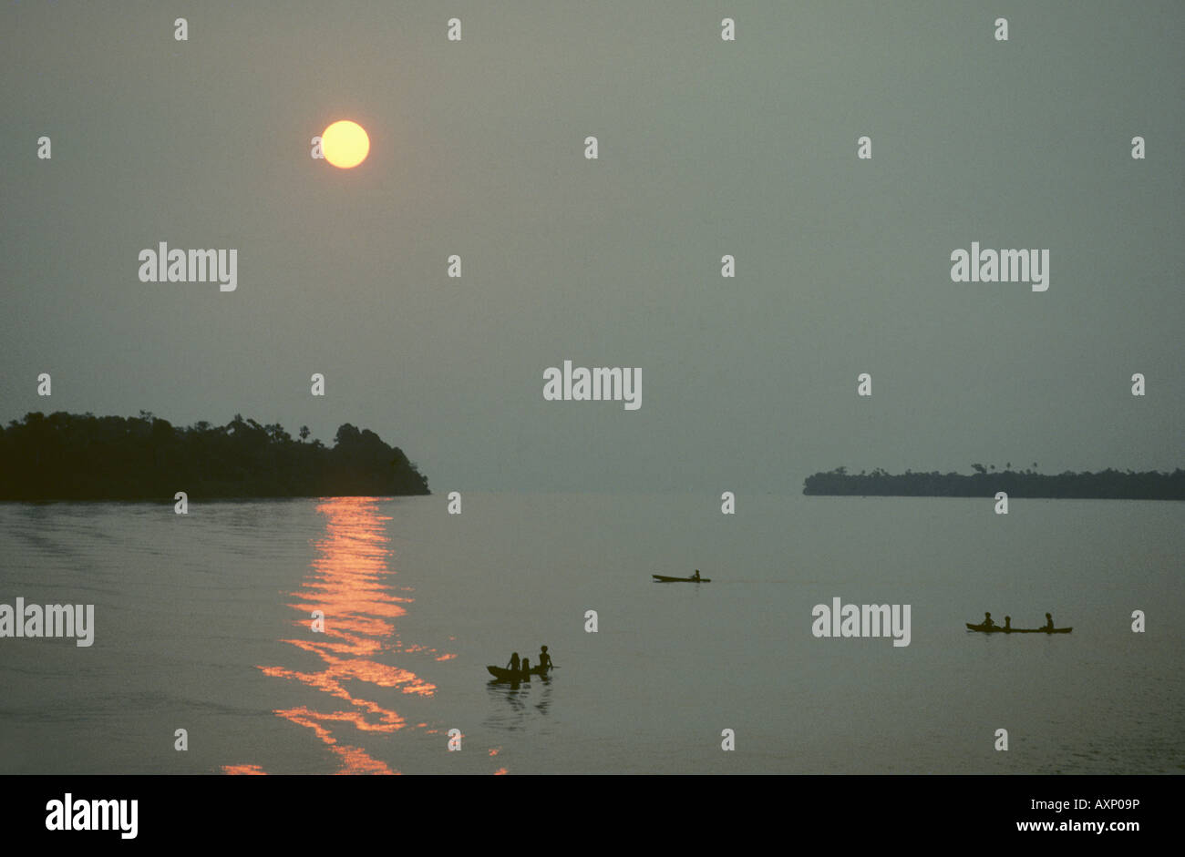 Sunset over Amazon River ,with dugouts Brazil Stock Photo - Alamy