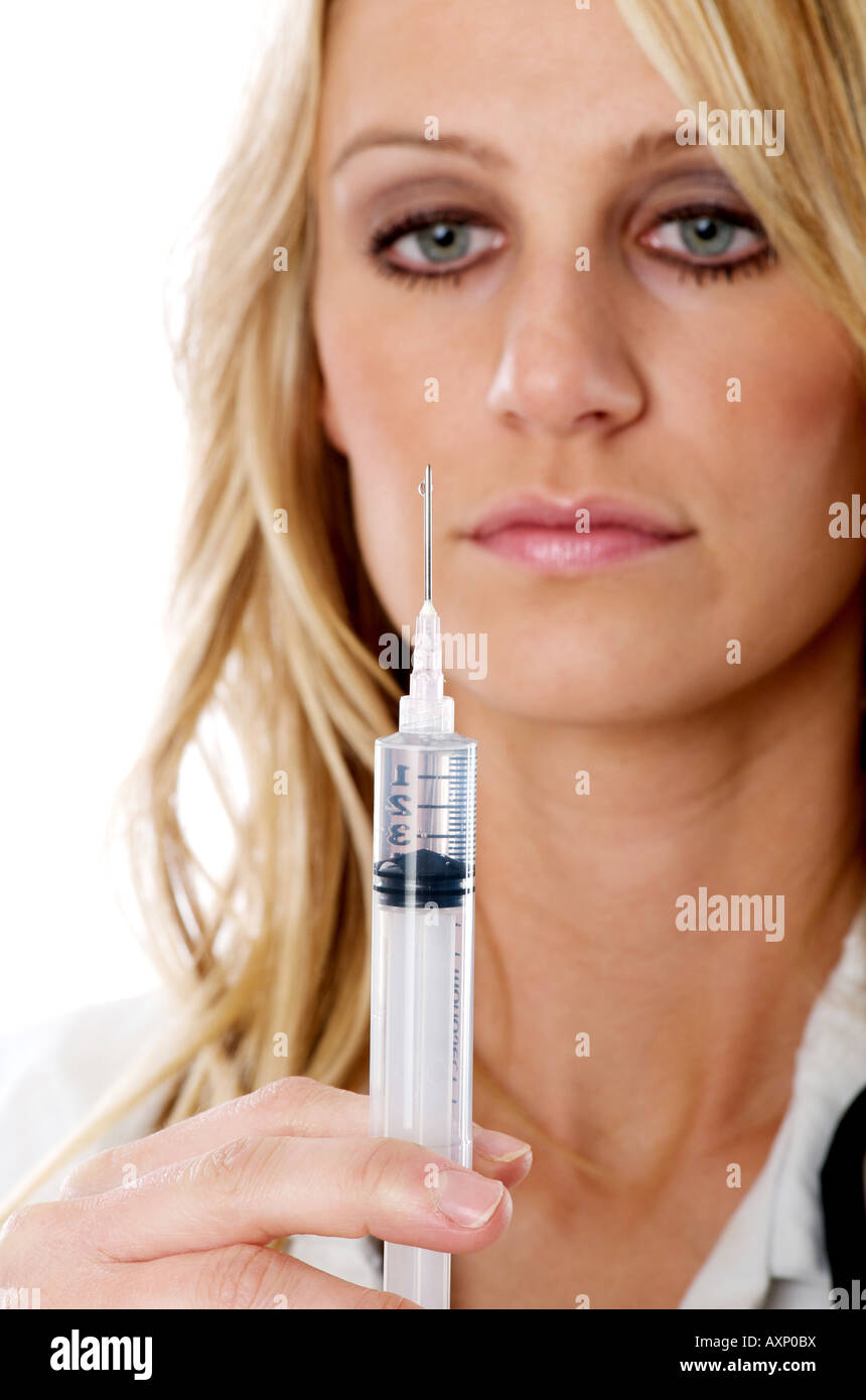 Image of a female doctor with a syringe on white Stock Photo - Alamy