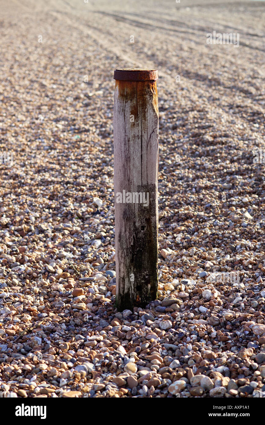 Post on pebble beach Stock Photo - Alamy