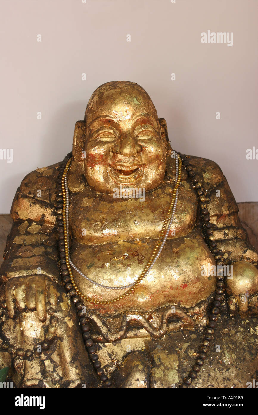 Smiling buddha hi-res stock photography and images - Alamy