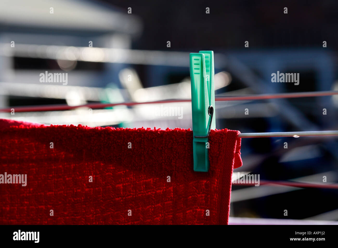 PEGS HOLDING WASHING ON THE LINE Stock Photo - Alamy