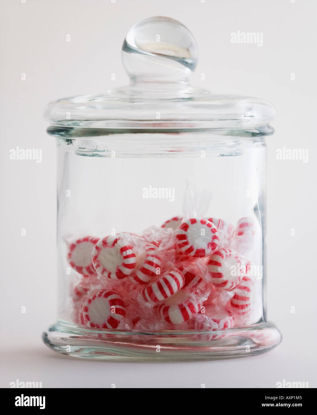 Peppermint candies in glass jar Stock Photo - Alamy