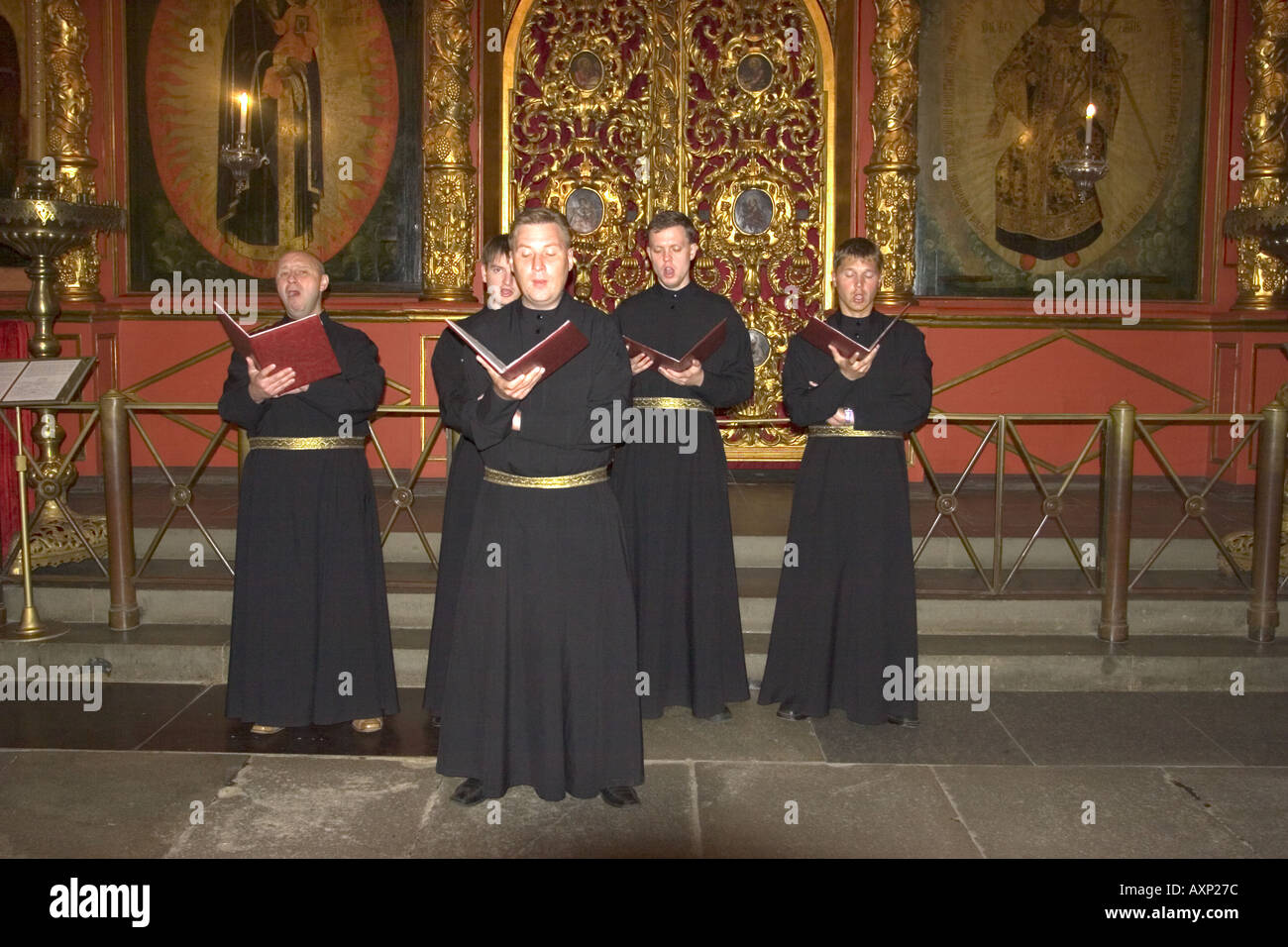 Five Priests Singing in front of Iconostasis of Archangel Cathedral ...